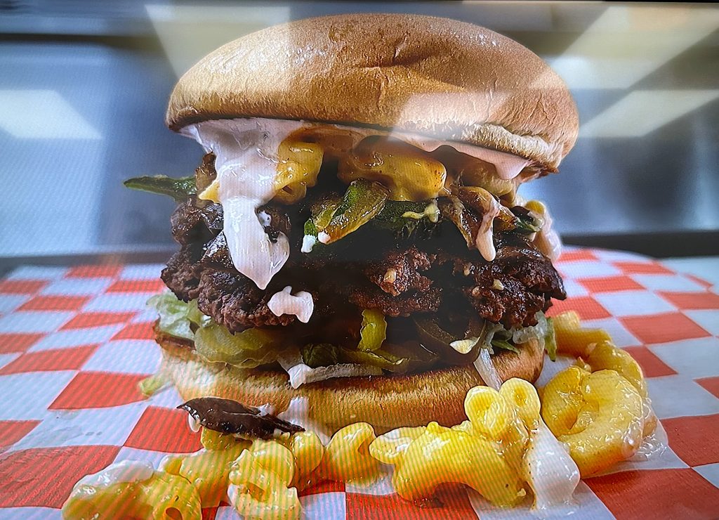 Burger place offers mile-high toppings, tasty chopped cheese