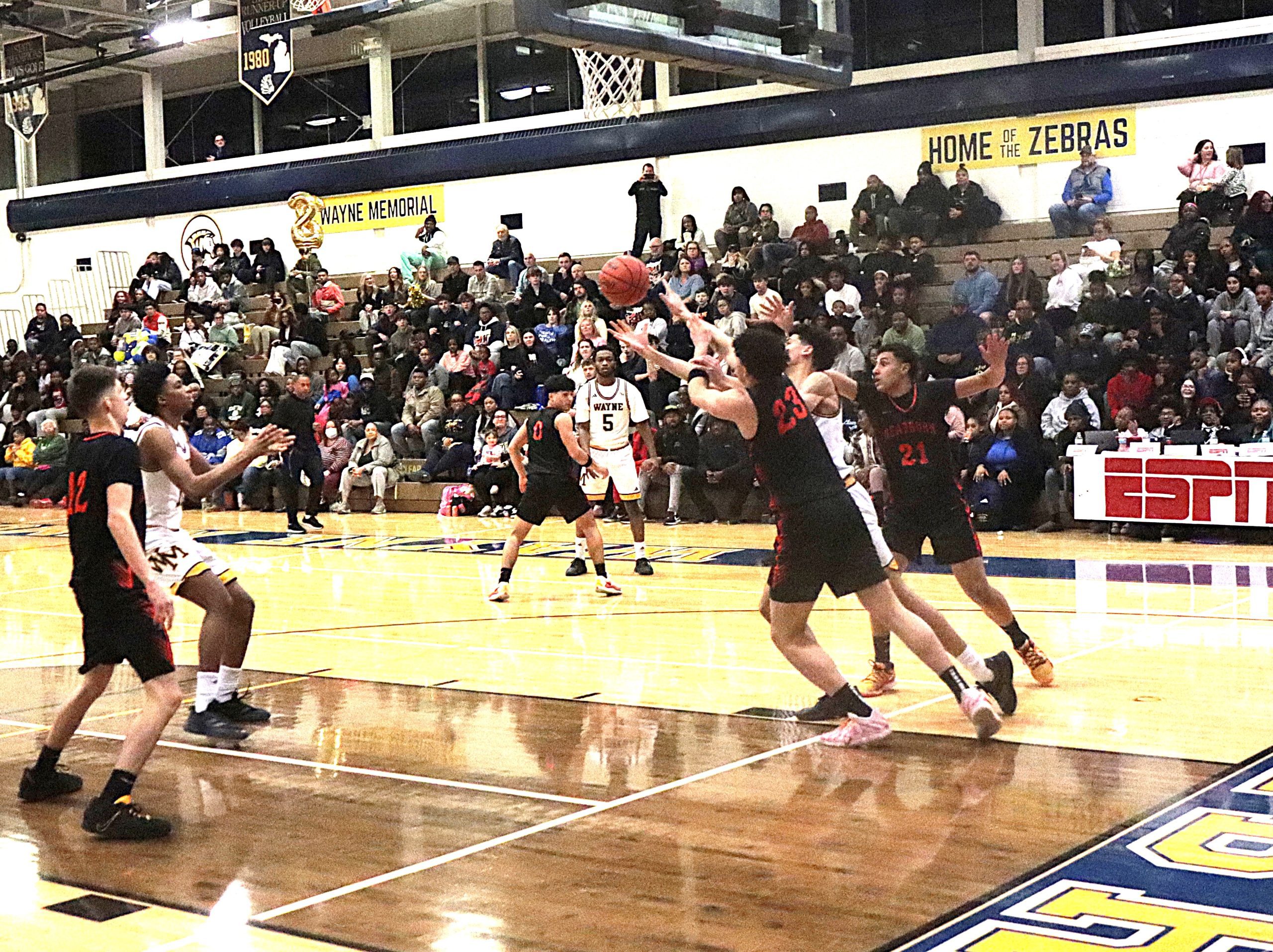 Wayne wins KLAA East after repelling Dearborn's late rally
